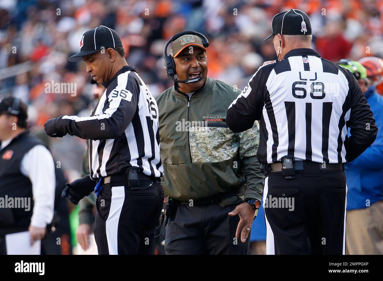 Cincinnati Bengals head coach Marvin Lewis, center, argues with line ...