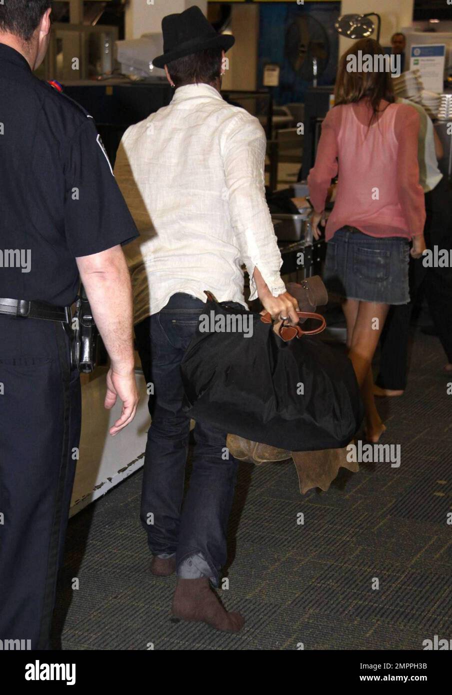 Exclusive!! Colin Farrell passed through security at Miami airport with ...