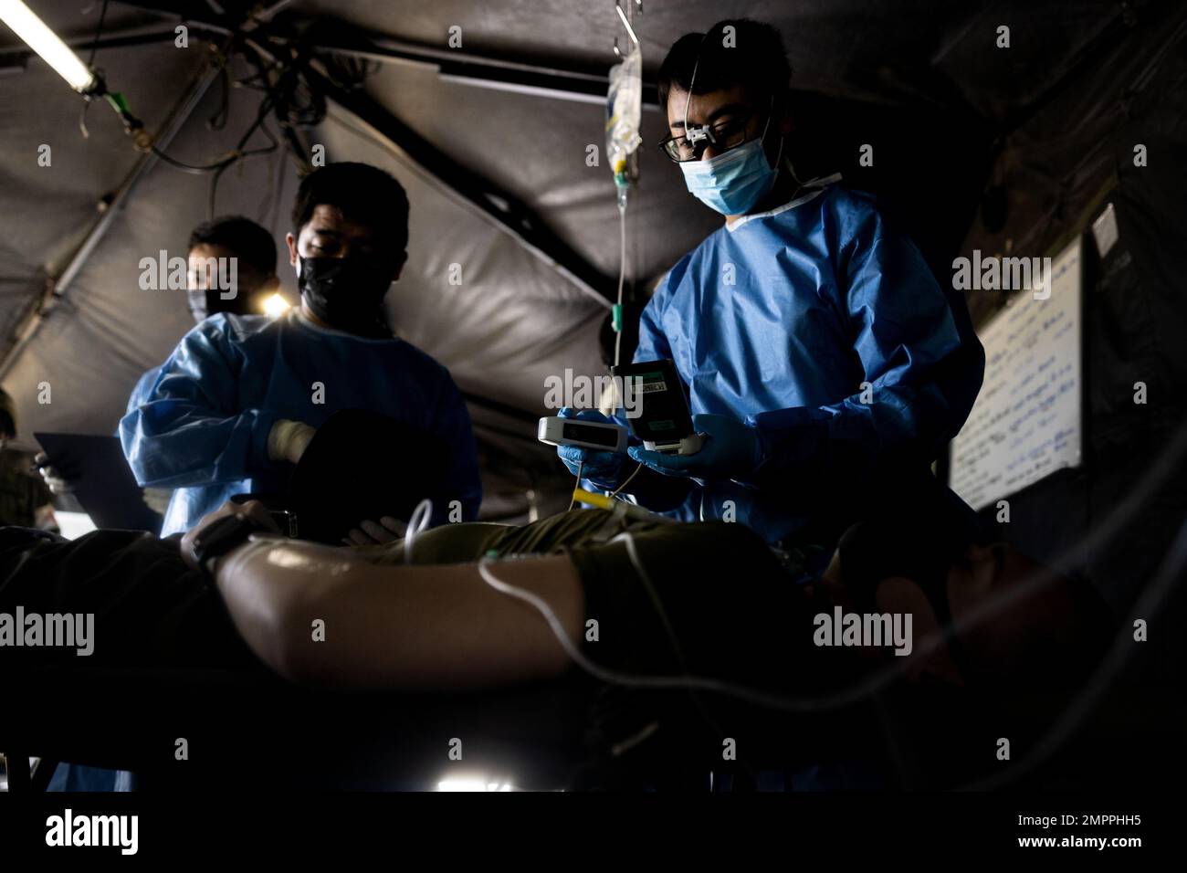 U.S. Navy surgeons with 3d Medical Battalion and Japan Ground Self ...