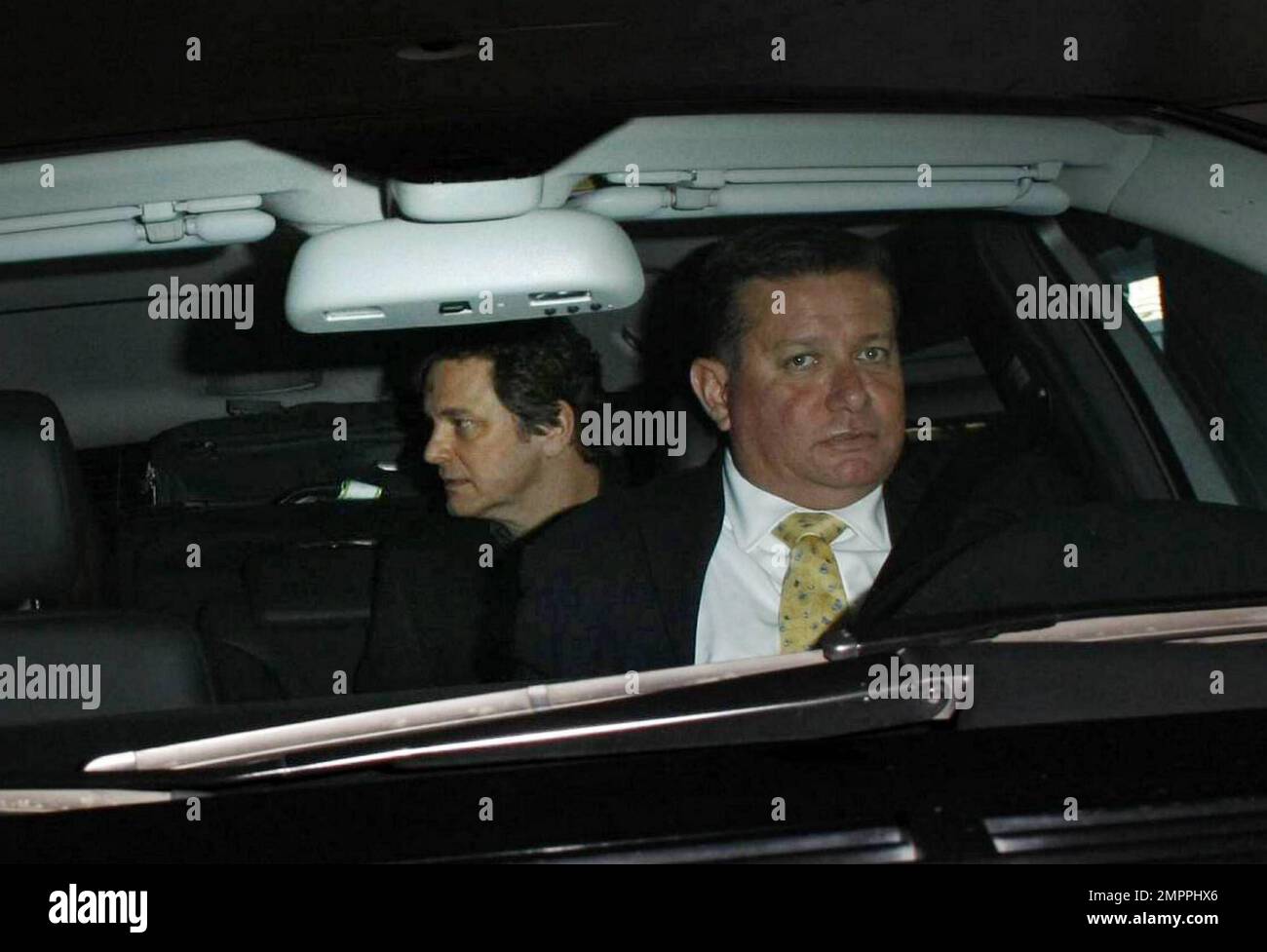 Oscar nominee Colin Firth navigates his way through the parking lot of ...