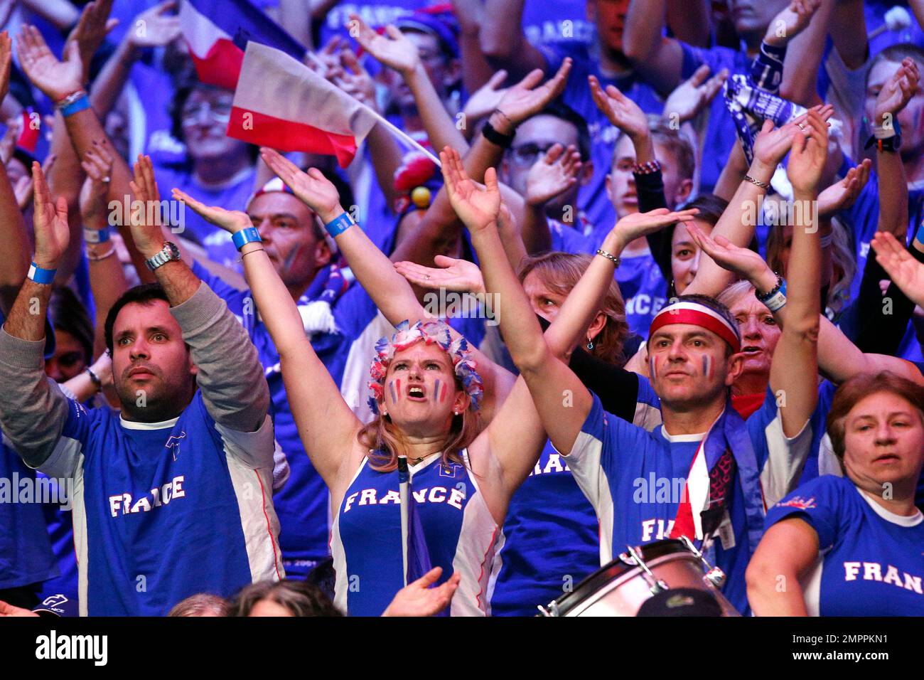 French tennis supporters clap their hands as France's Lucas Pouille ...