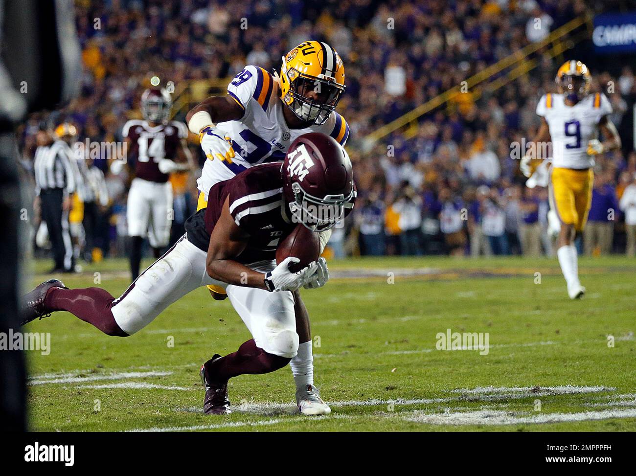 Texas A&M wide receiver Jhamon Ausbon pulls in a pass in front of LSU ...
