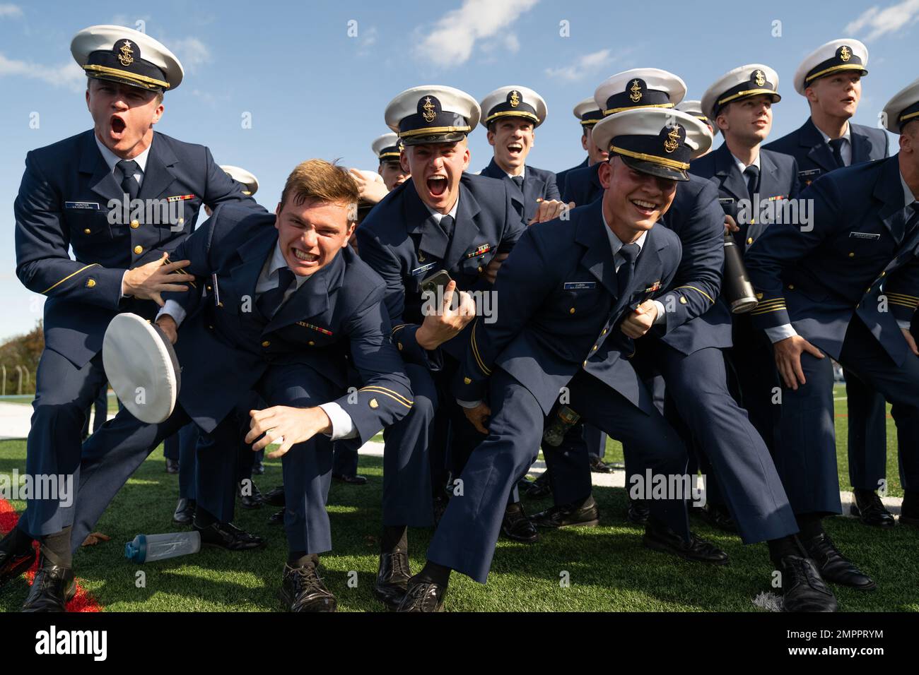 Coast Guard Academy cadets get hyped up as they await their football ...