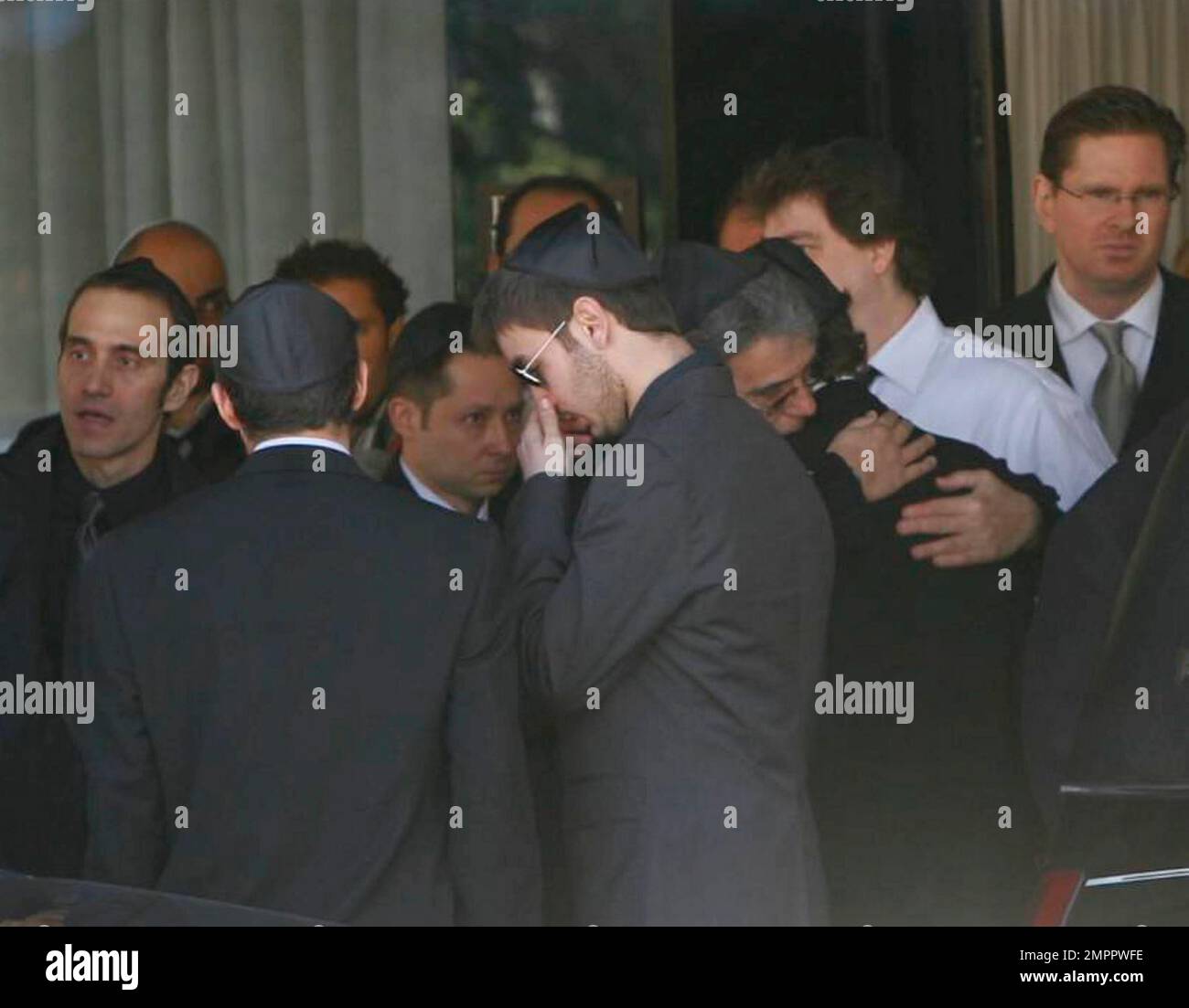Family and friends gather outside Steeles Memorial Chapel after actor ...