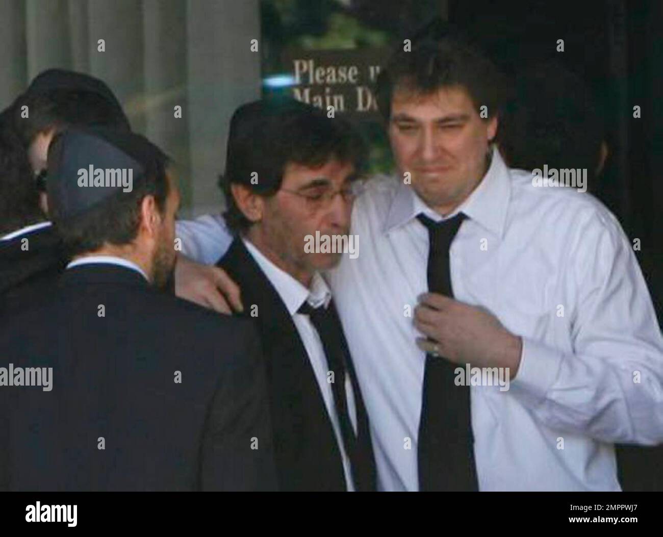 Family and friends gather outside Steeles Memorial Chapel after actor ...