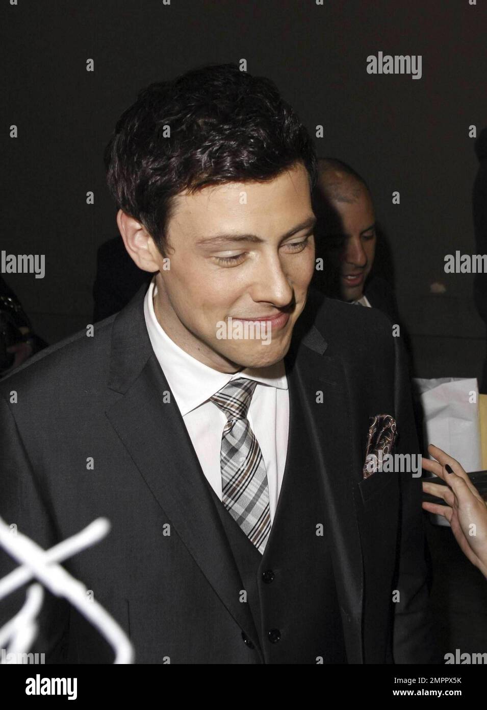 "Glee" star Cory Monteith looks handsome in a suit and tie as he signs ...