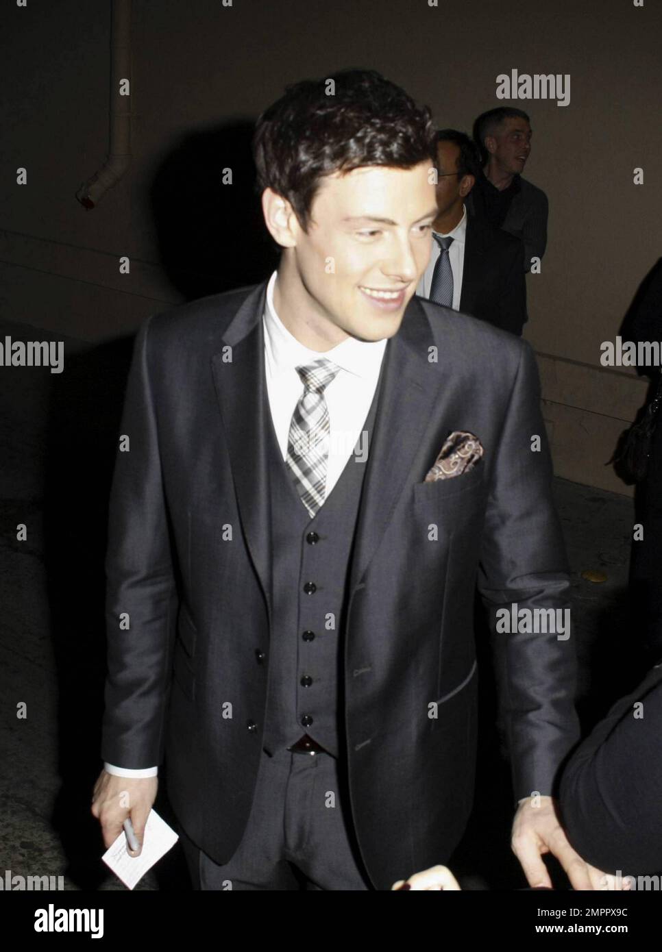 "Glee" star Cory Monteith looks handsome in a suit and tie as he signs ...