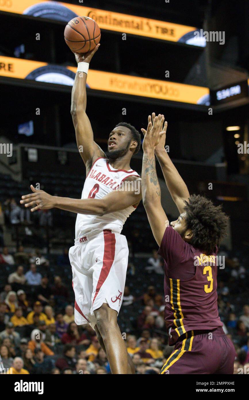 Alabama forward Donta Hall (0) goes to the basket past Minnesota ...