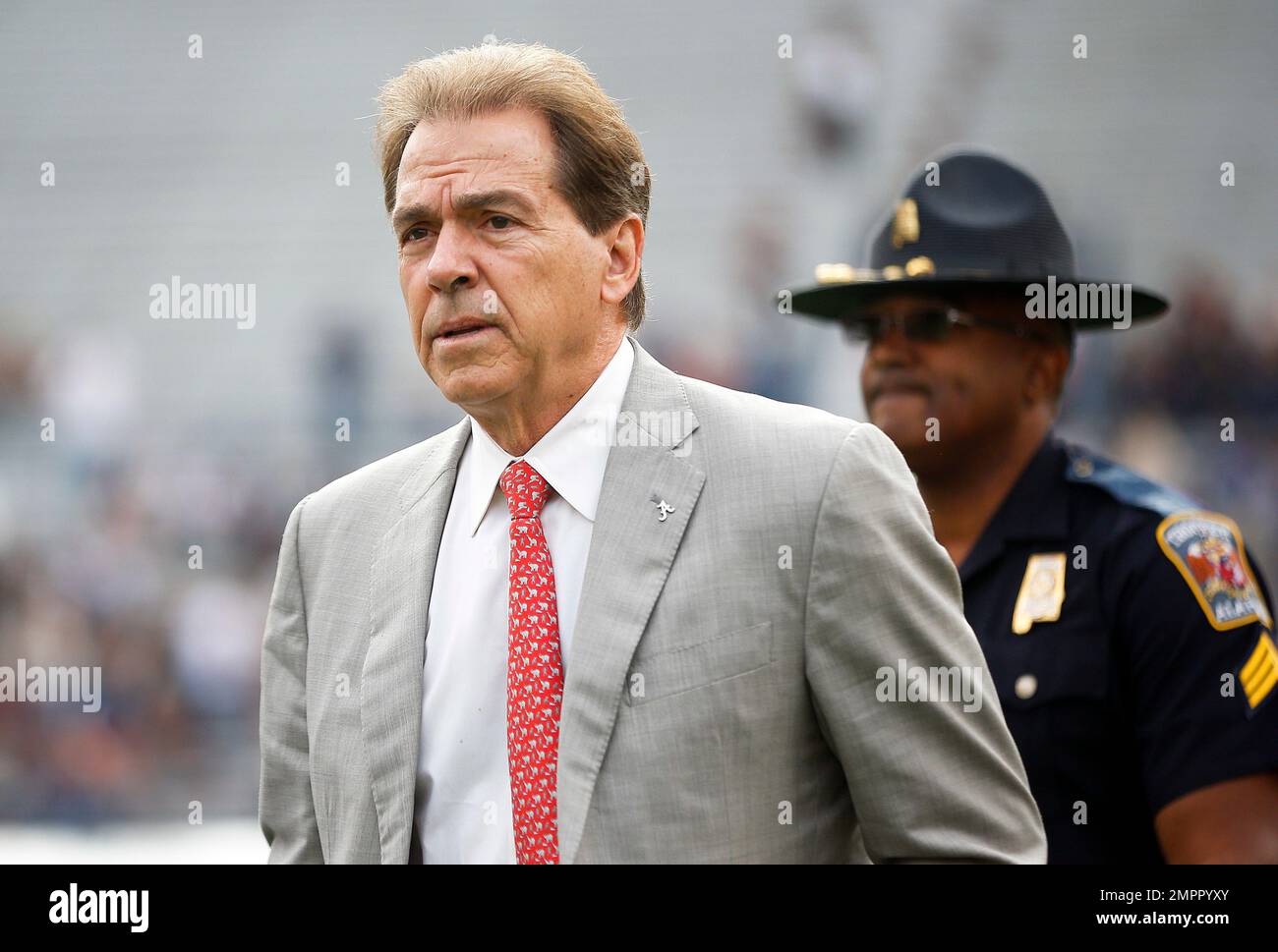 Alabama head coach Nick Saban walks the field before the Iron Bowl NCAA ...