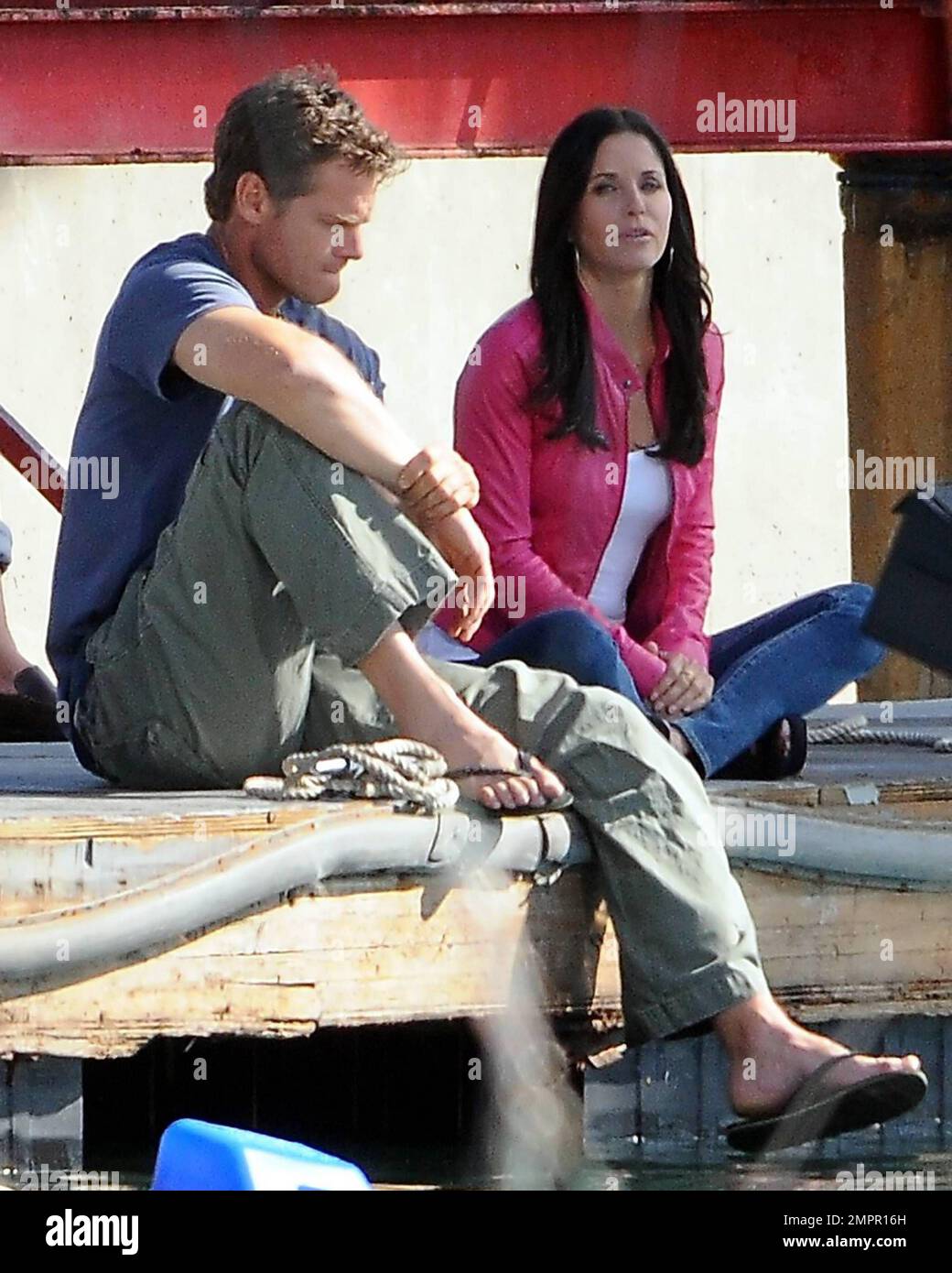Courteney Cox and Brian Van Holt look to be deep in conversation while ...