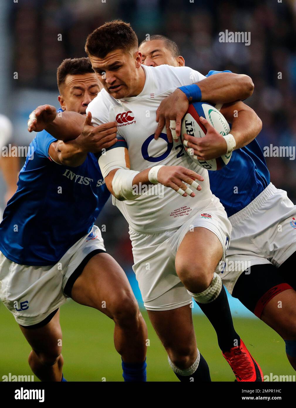 England's Alex Lozowski, center, runs with the ball during the rugby ...