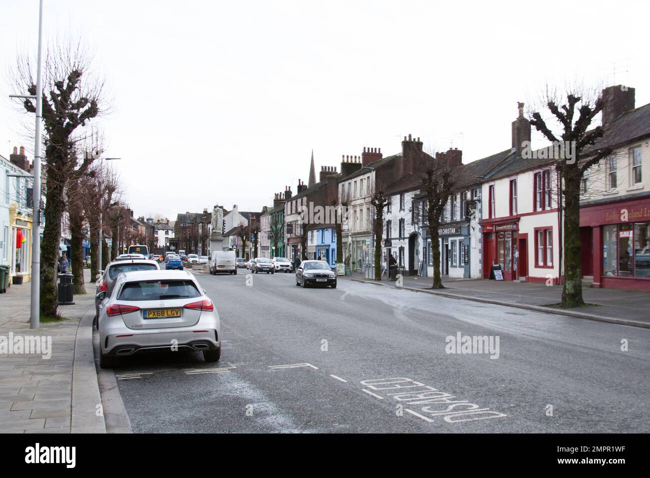 Views along Main Street in Cockermouth, Cumbria in the UK Stock Photo ...