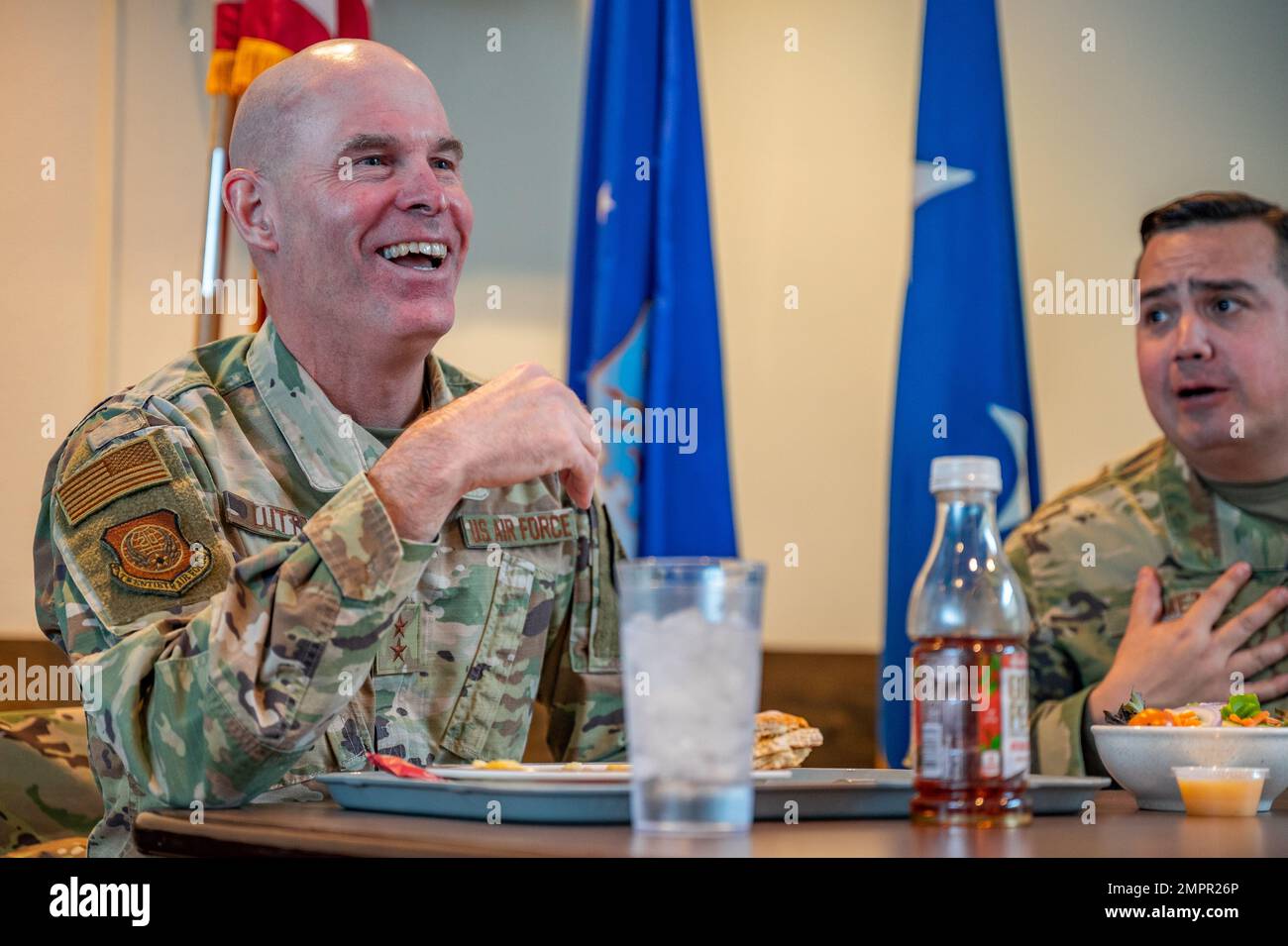 Maj. Gen. Michael Lutton, 20th Air Force commander, laughs at a joke ...
