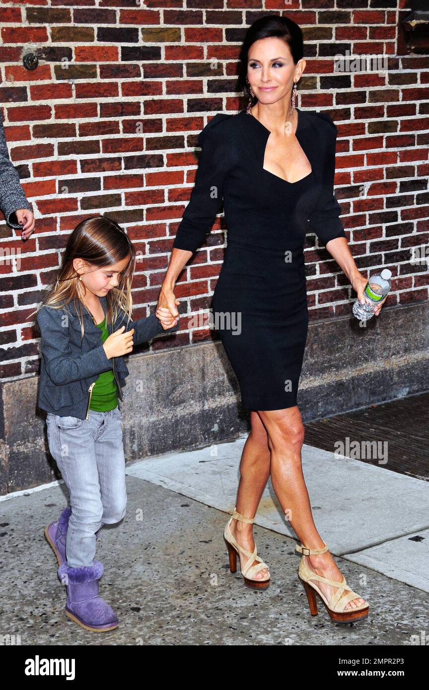 Courteney Cox and daughter Coco pose for photos outside the "Late Show ...