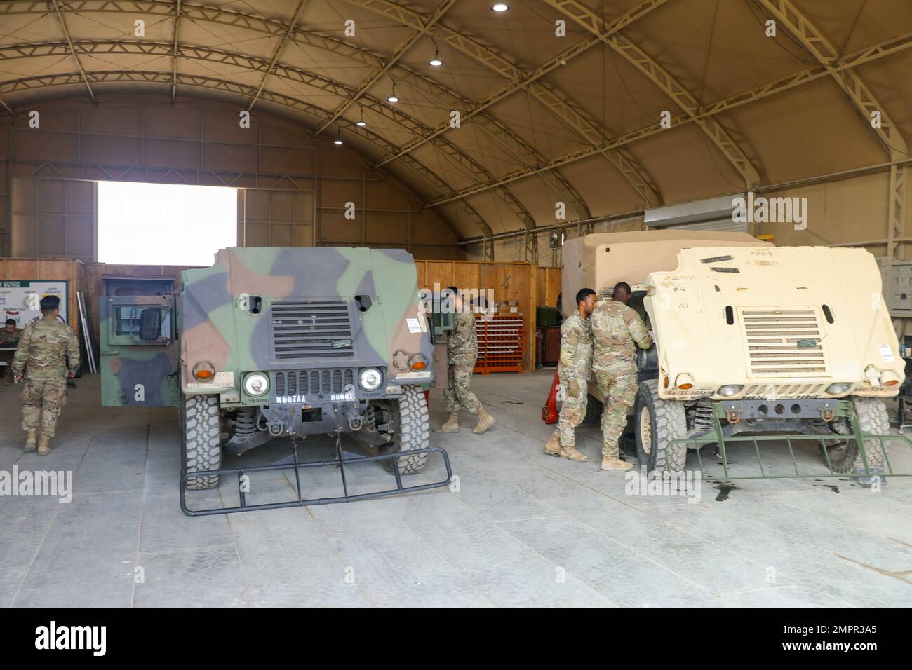 Soldiers with the 369th Sustainment Brigade work in the unit’s motor ...