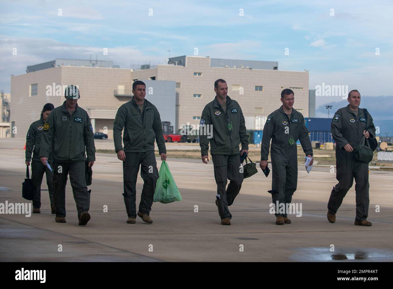 Pilots from the 555th Fighter Squadron approach the hangar during ...