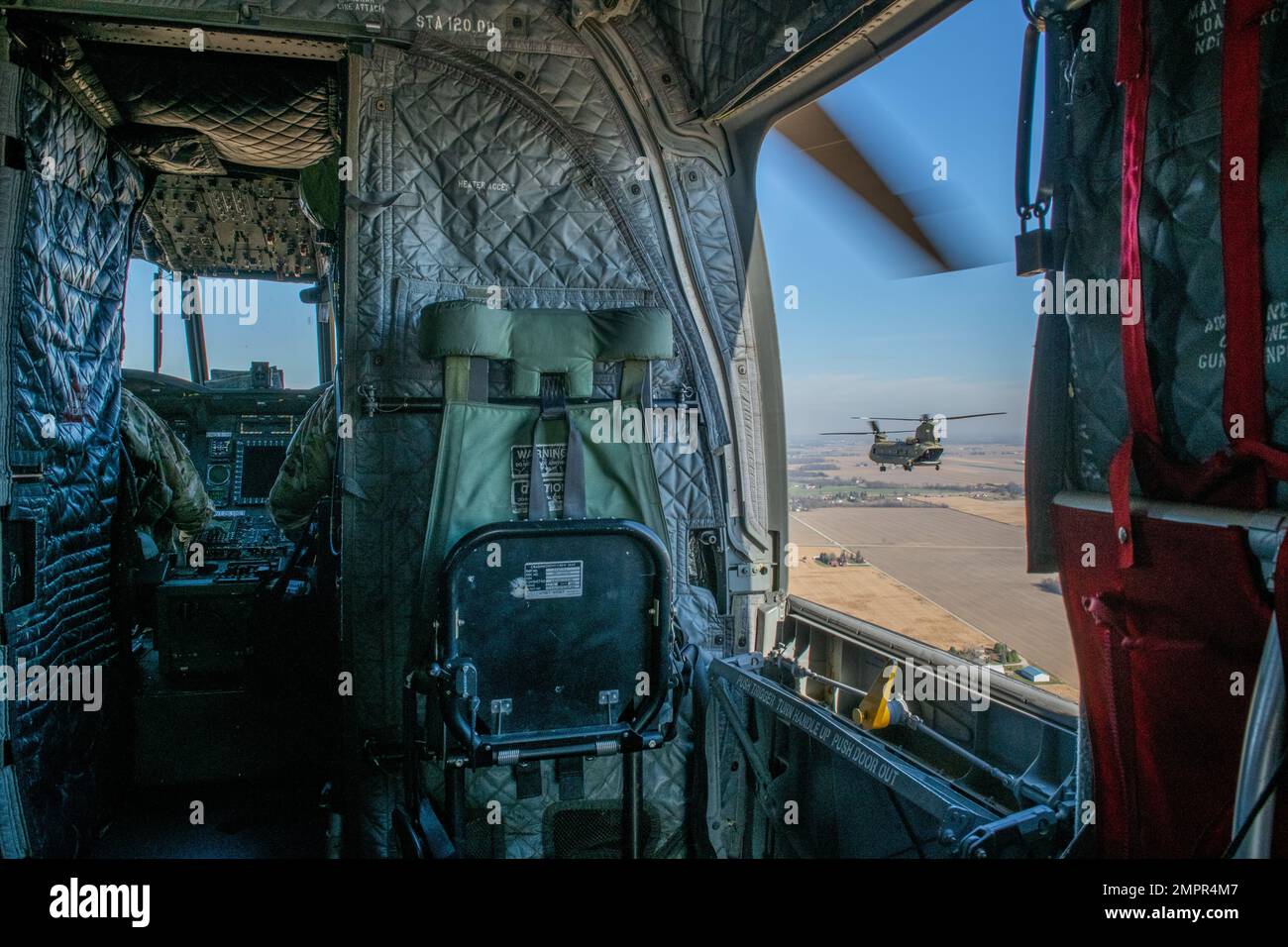 A CH-47 Chinook assigned to Army Aviation Support Facility #2 (AASF #2) flies over Michigan on ...