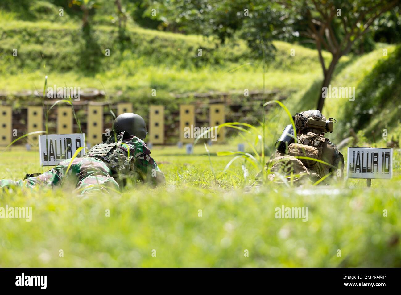U.S. Marine Corps Cpl. Jordan Buisch, right, a reconnaissance radio operator with Marine ...