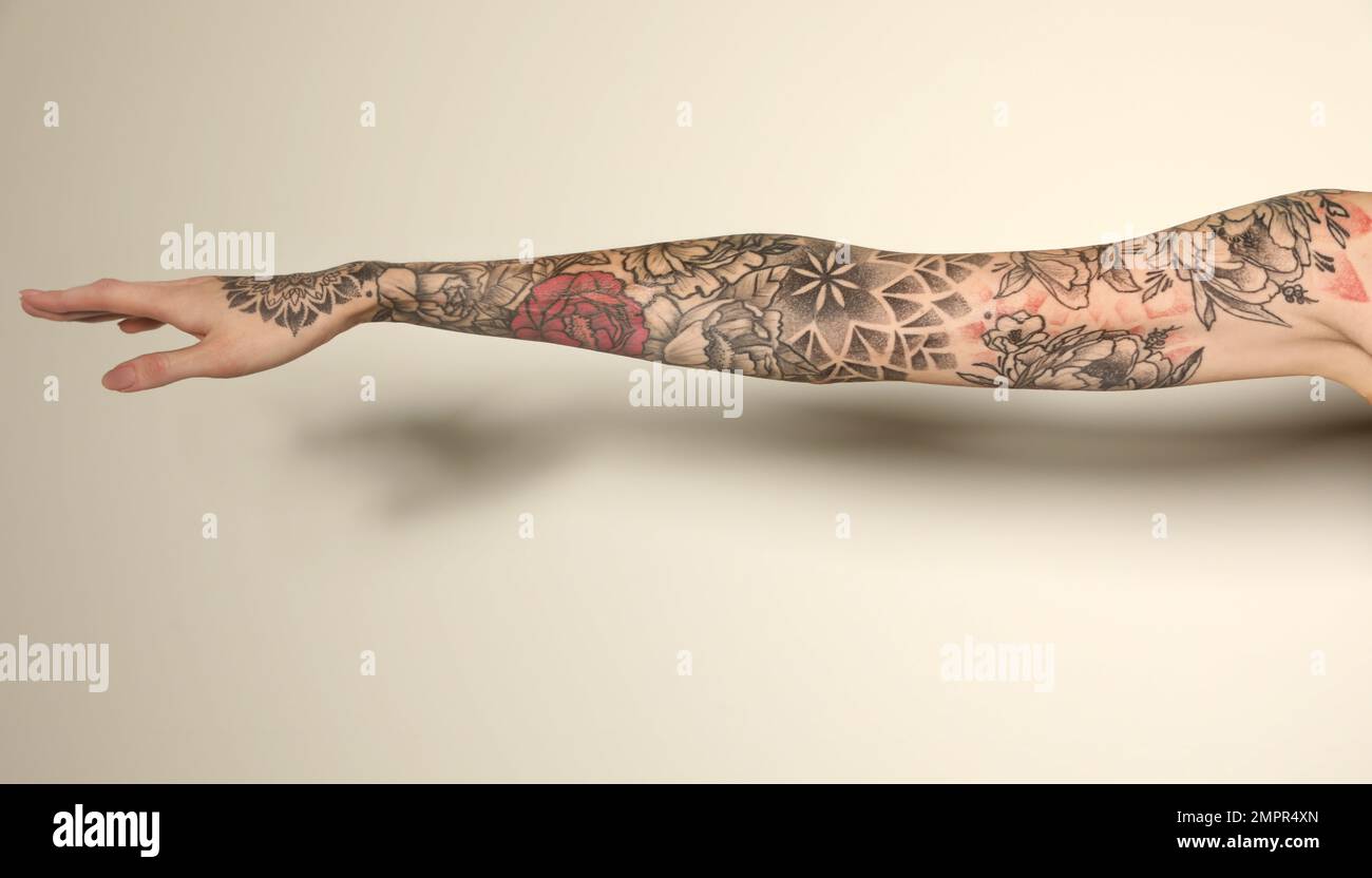 Female tattoos her arm hi-res stock photography and images - Alamy