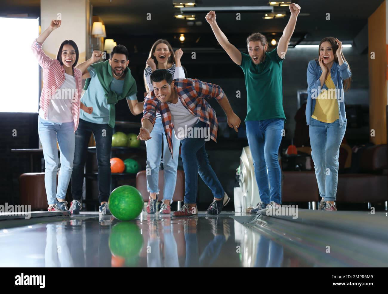 Group friends throwing balls hi-res stock photography and images - Alamy