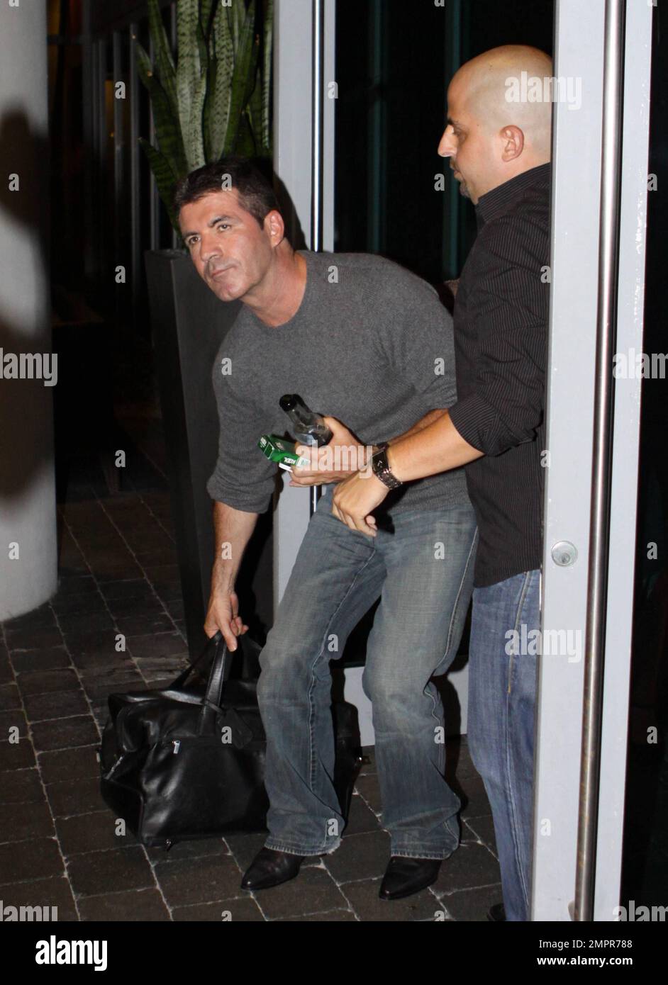 EXCLUSIVE!! Simon Cowell returns to his hotel after a long day of ...