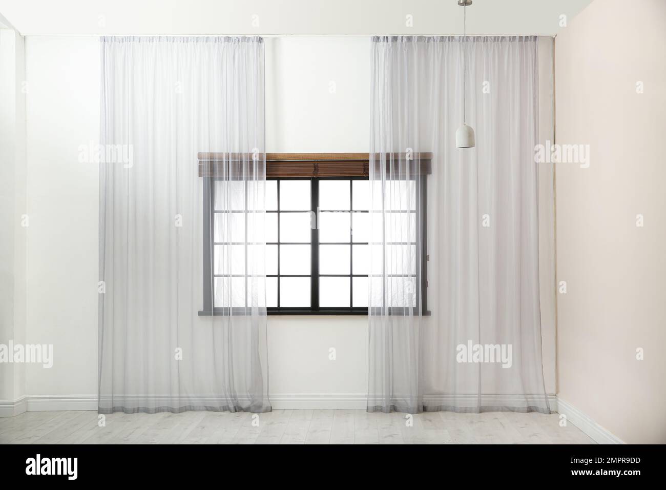 Window with beautiful curtains and open blinds in empty room Stock ...