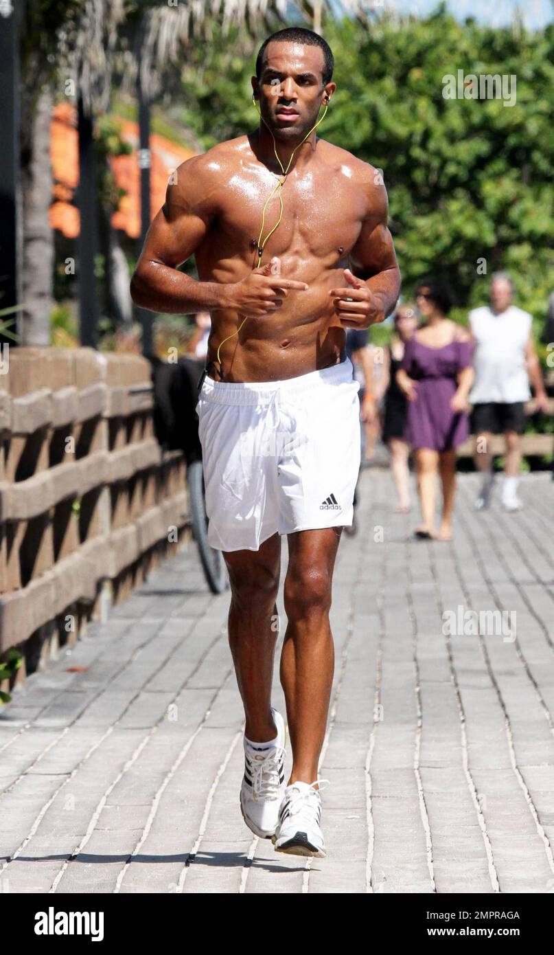 UK singer songwriter Craig David shows off his odd looking six pack ...