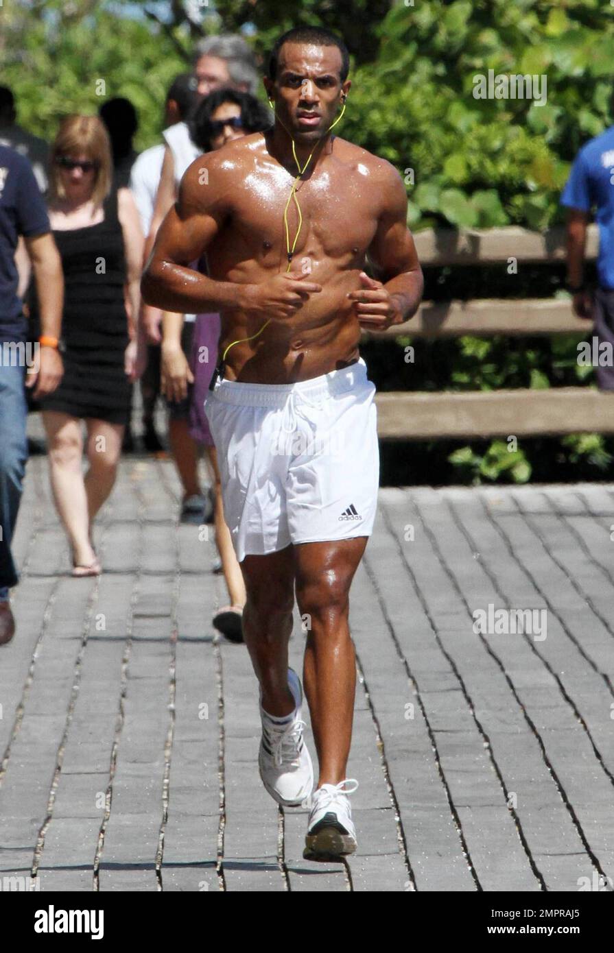 UK singer songwriter Craig David shows off his odd looking six pack ...