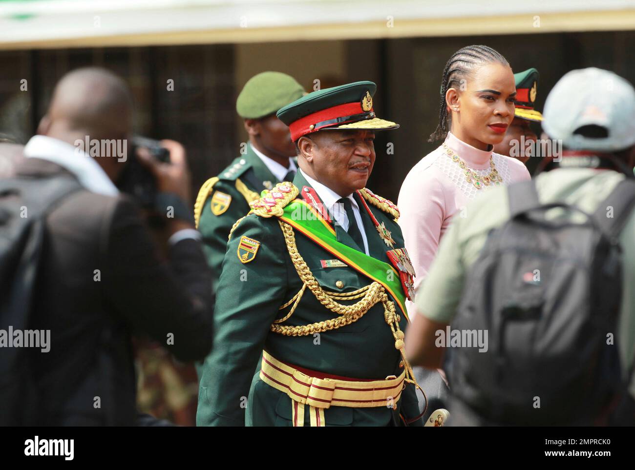 Army General Constantino Chiwenga, center, arrives with his wife Mary ...