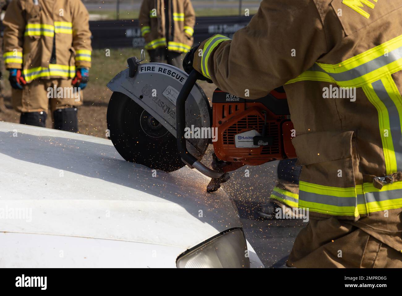 A U.S. Marine with Marine Wing Support Squadron (MWSS) 472 uses a K-12 ...