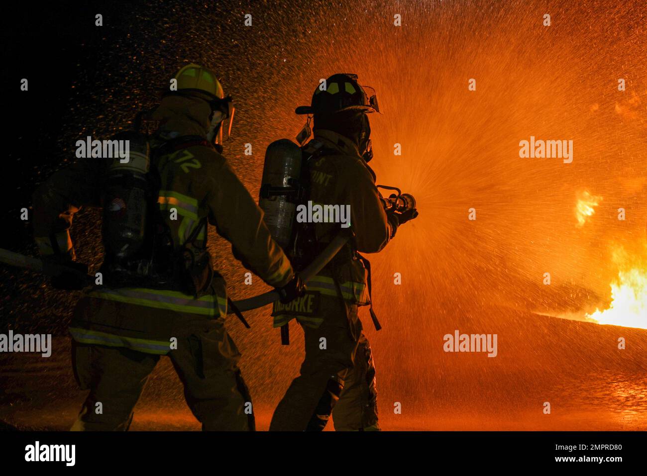 U.S. Marines with Marine Wing Support Squadron (MWSS) 472 use hand-line ...