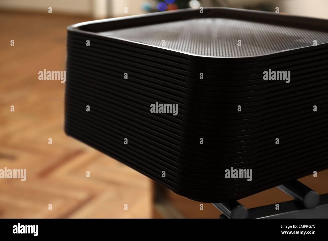 Stack of plastic trays for food in school canteen Stock Photo - Alamy
