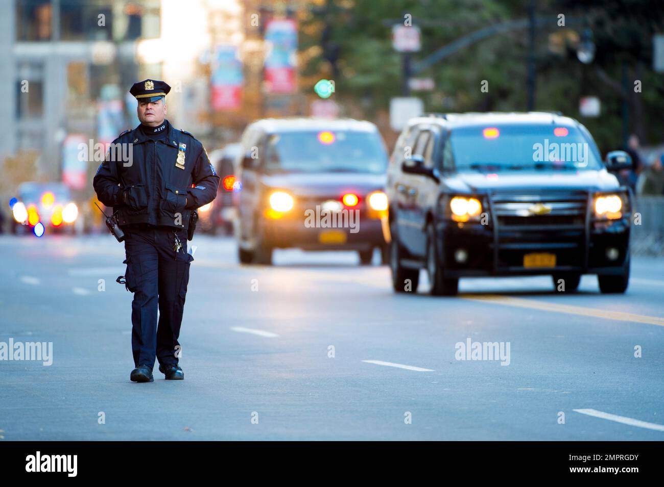 NYPD police officers patrol the parade route at the 91st Macy's ...