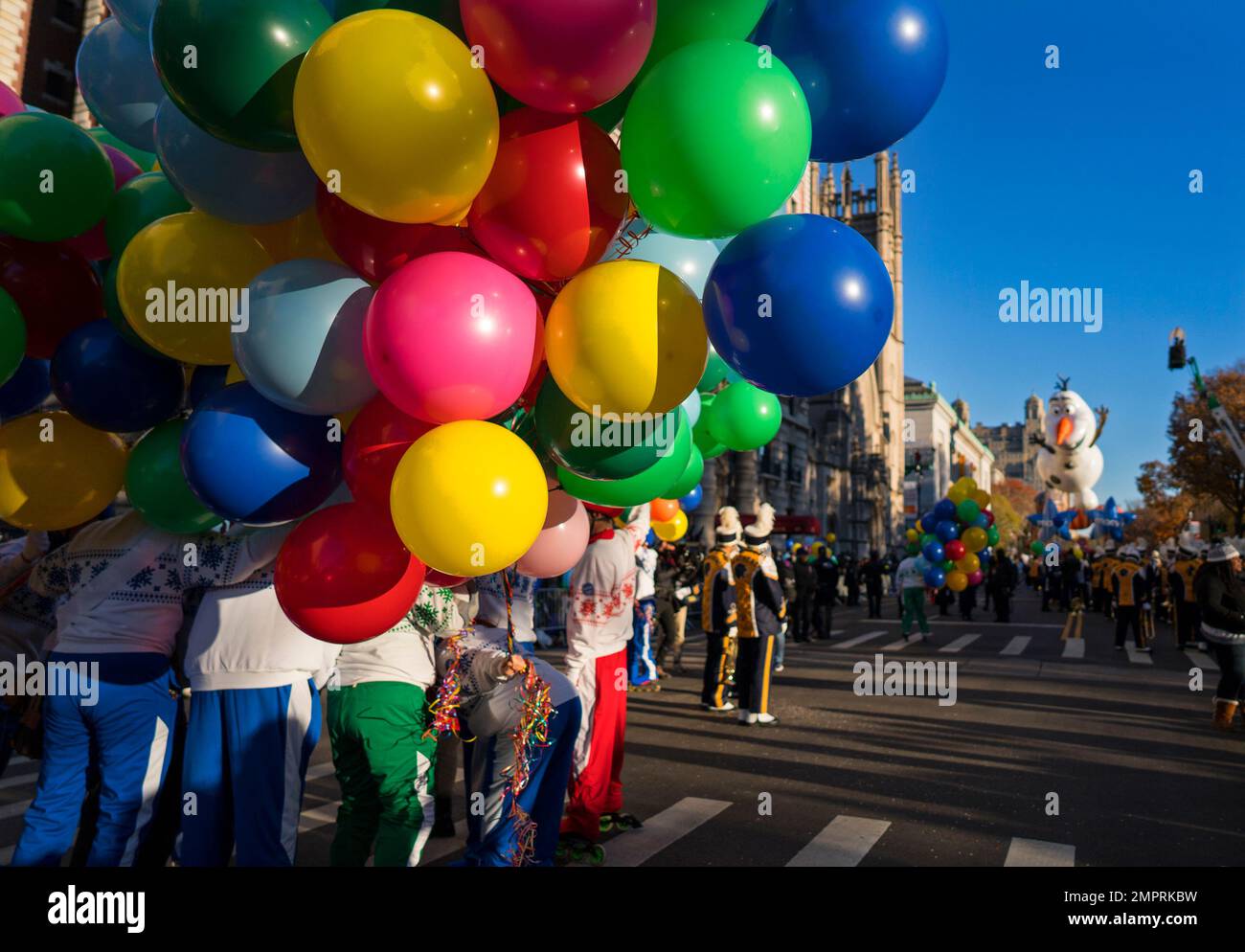 Participants take their place along the parade route before the Macy's ...