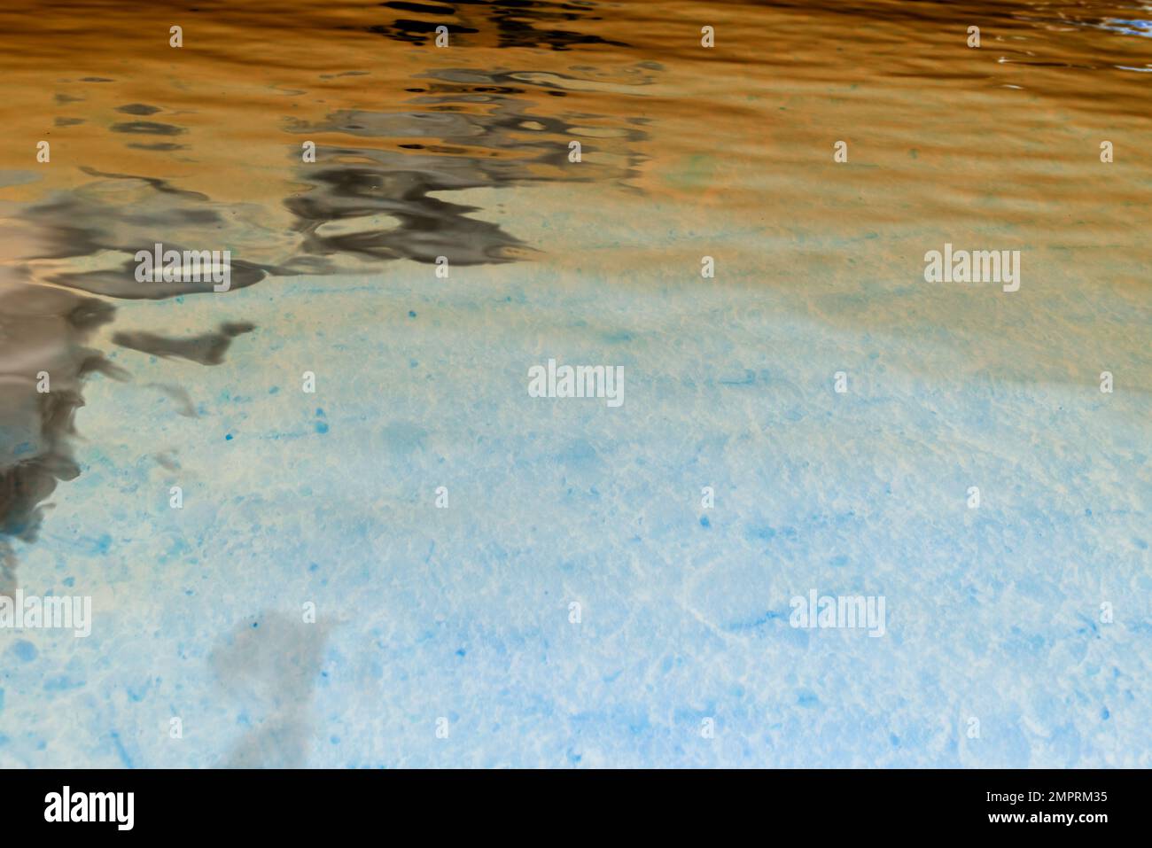 Abstract photo of the surface of the water with the reflection of light ...
