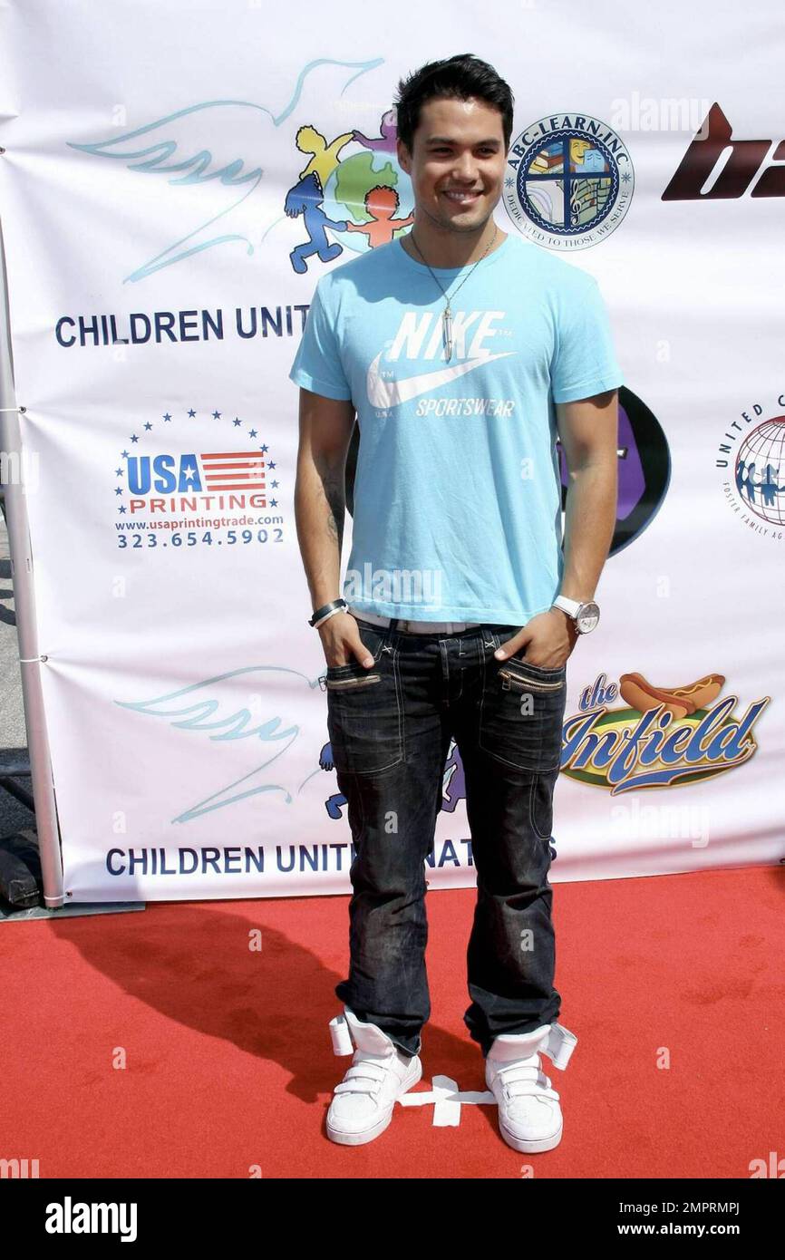 Michael Copon attends the Children Uniting Nations Day at Dodger ...