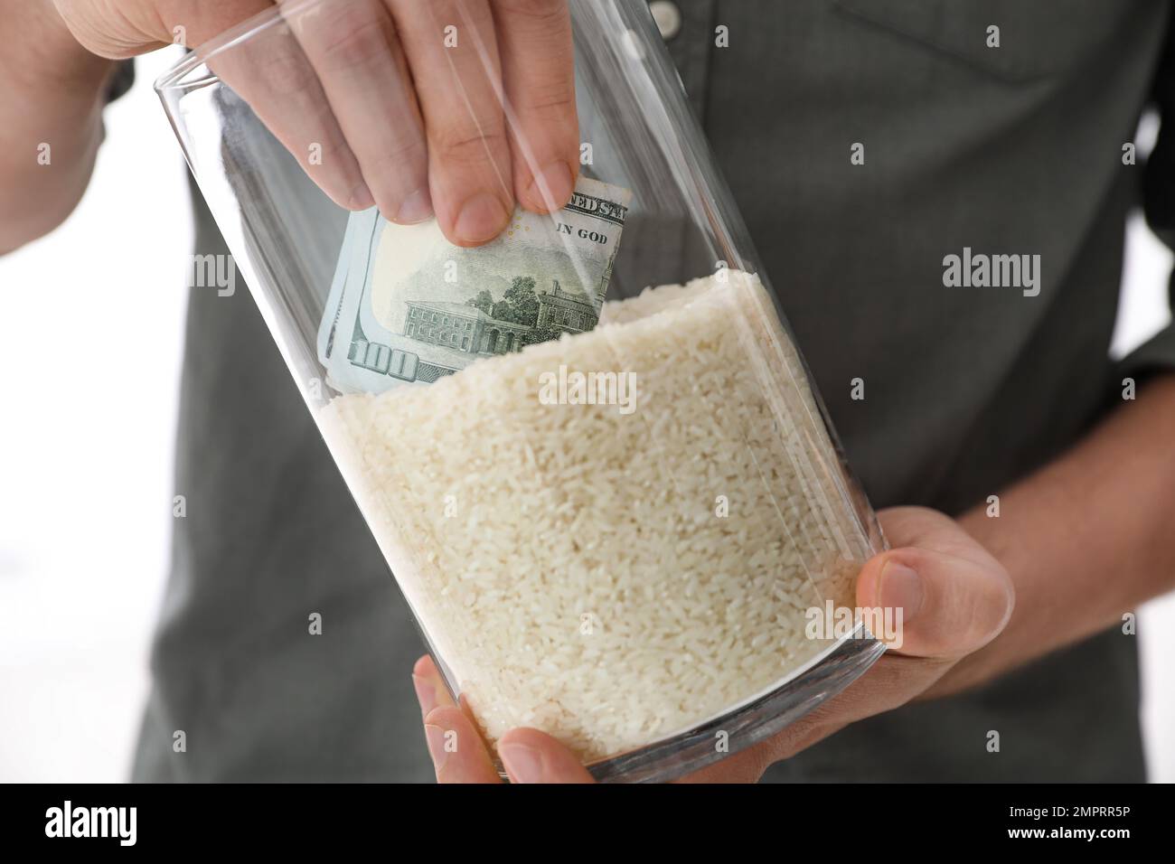 Money in jar hi-res stock photography and images - Alamy