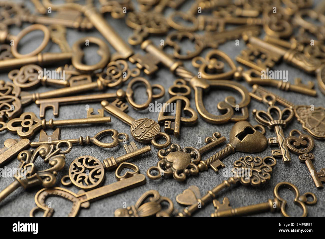 Steel keys on grey background, closeup. Safety concept Stock Photo - Alamy