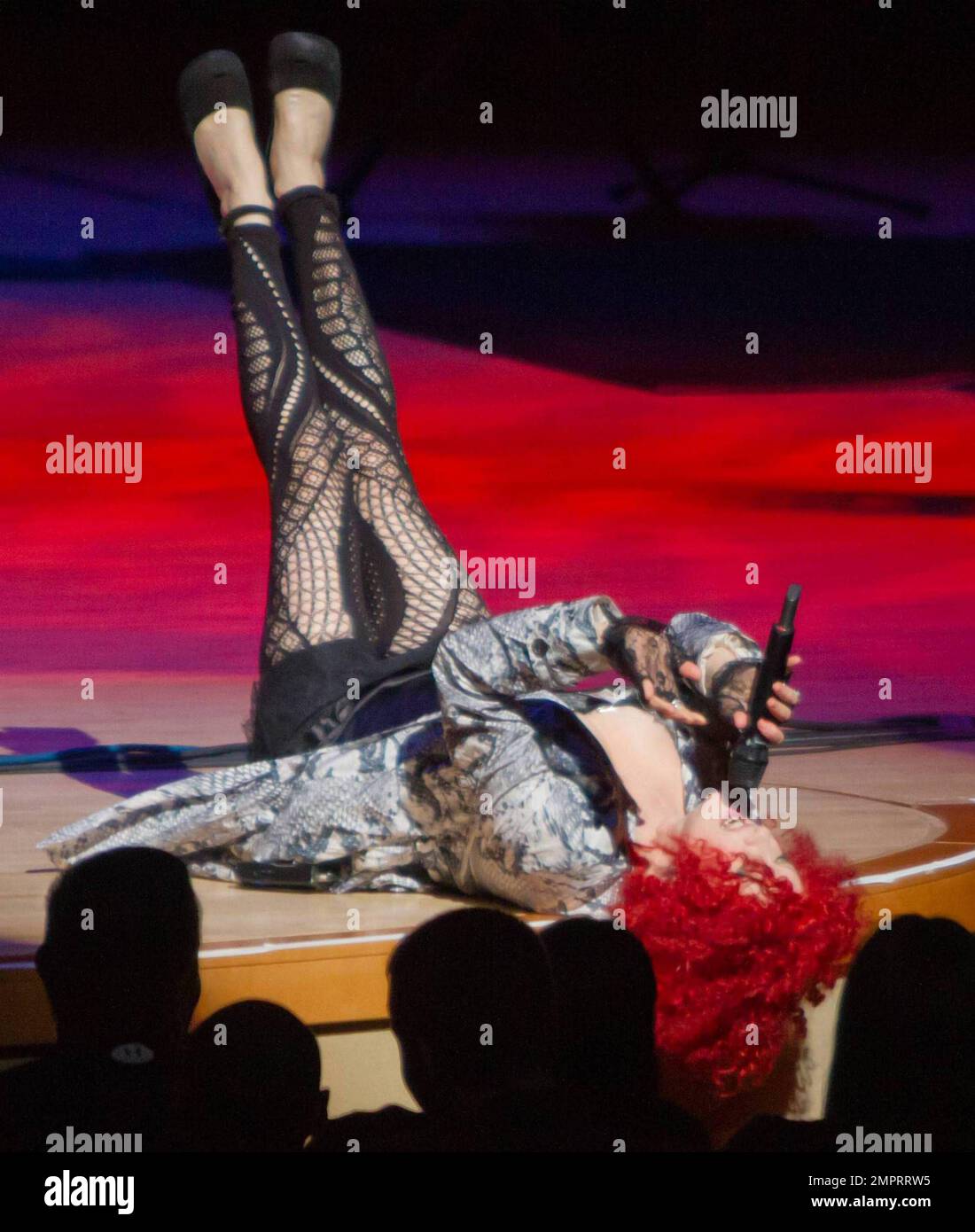 Legendary pop singer Cyndi Lauper shows off a trademark wild hairdo as ...