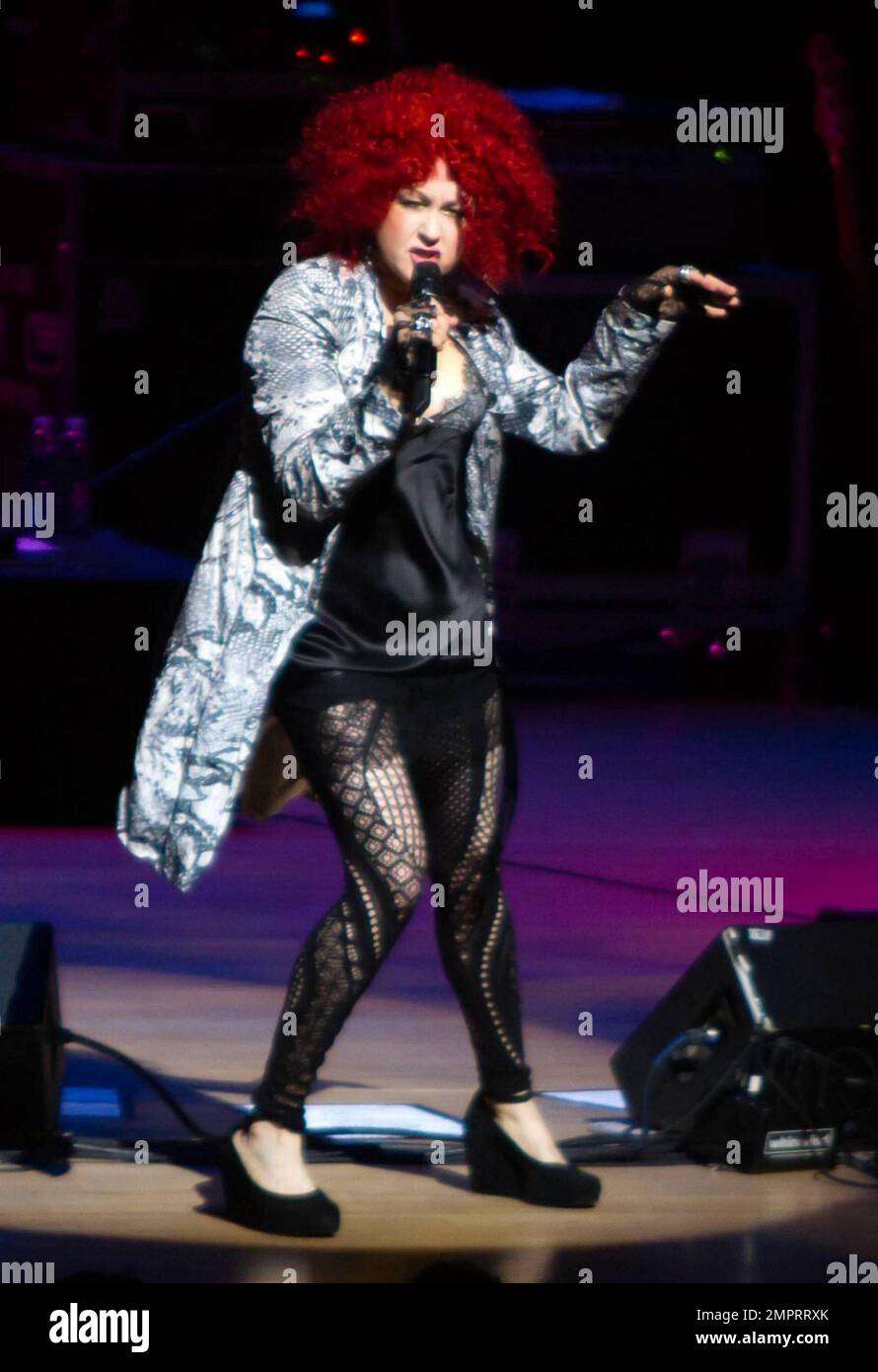 Legendary pop singer Cyndi Lauper shows off a trademark wild hairdo as ...