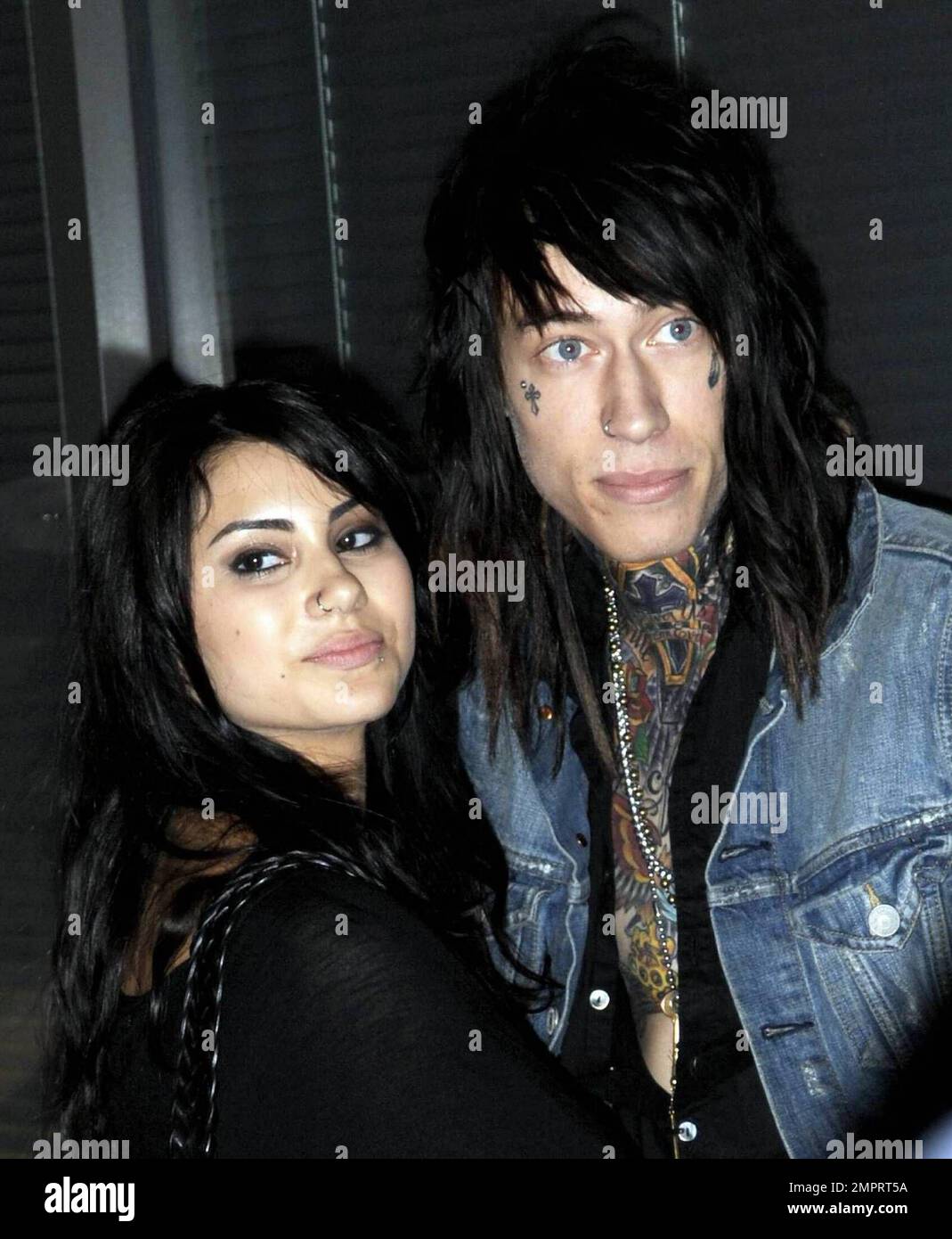 Trace Cyrus and a Demi Lovato lookalike leave Katsuya hand in hand. The ...