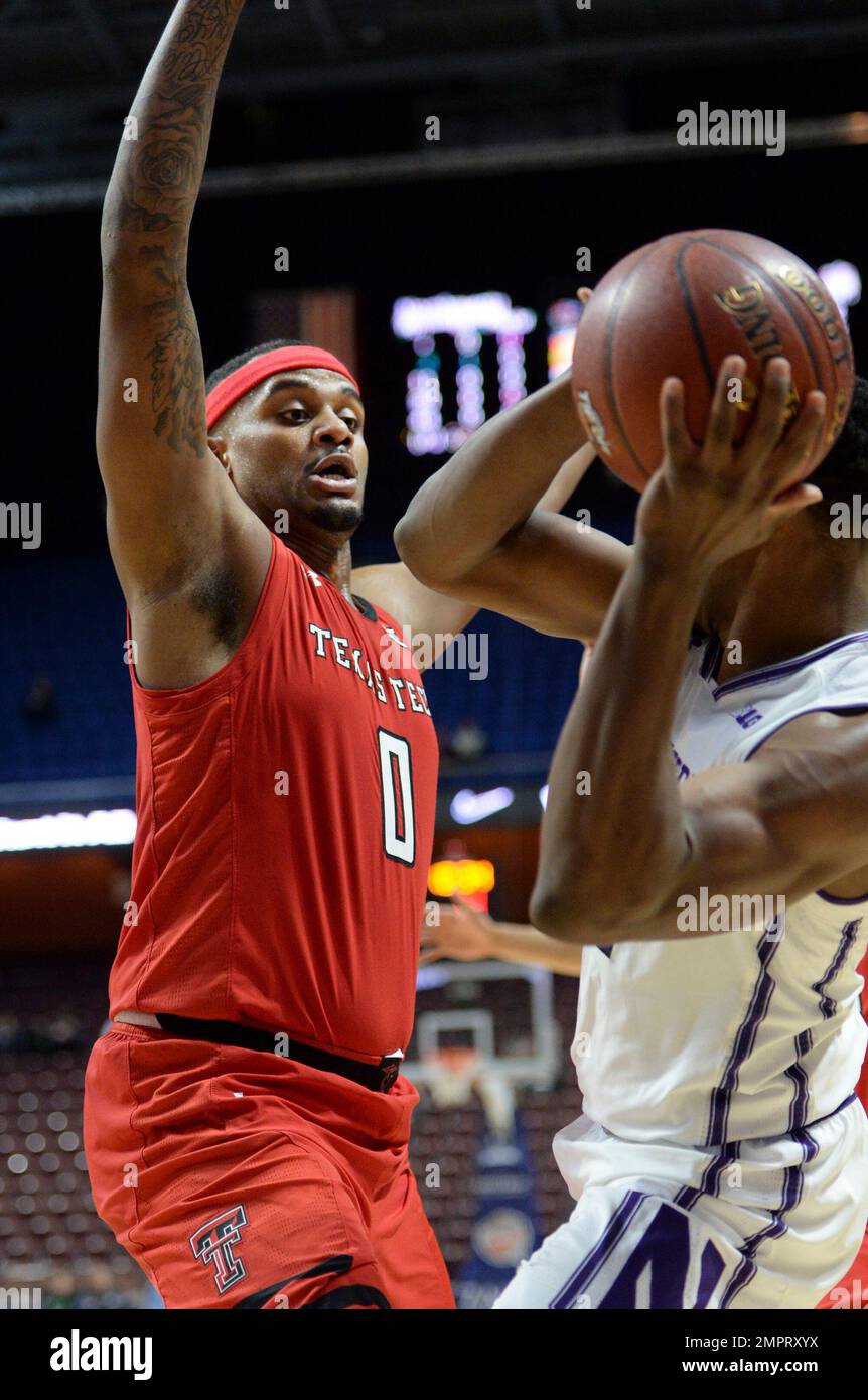 Texas Tech's forward Tommy Hamilton (0) guards Northwestern's Anthony ...