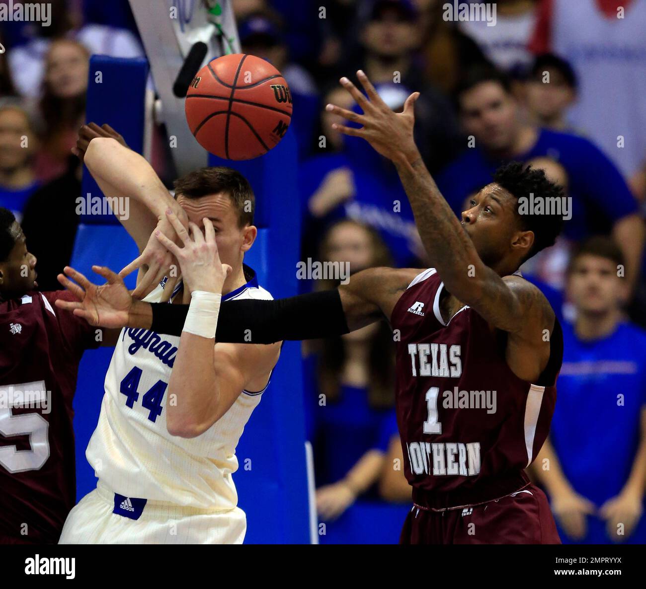 Kansas forward Mitch Lightfoot (44) rebounds against Texas Southern ...