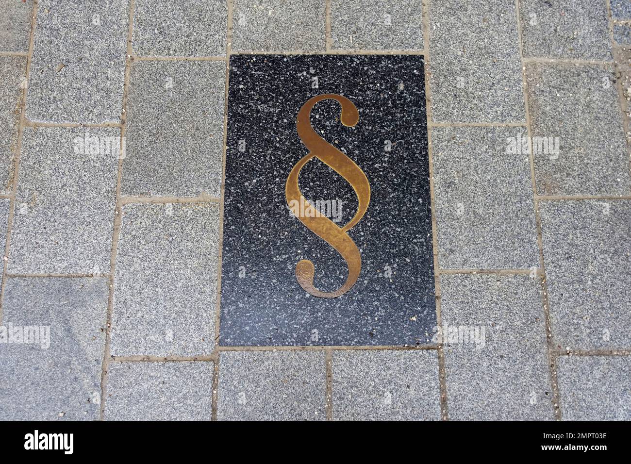 Section sign, pavement in front of a building, Grieskirchen, public ...