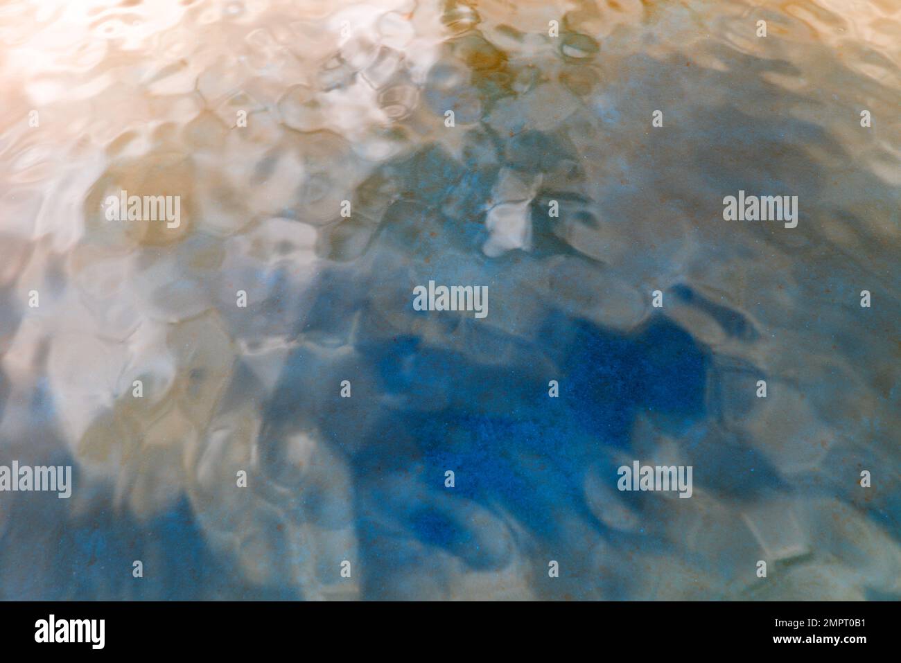 Abstract photo of the surface of the water with the reflection of the ...