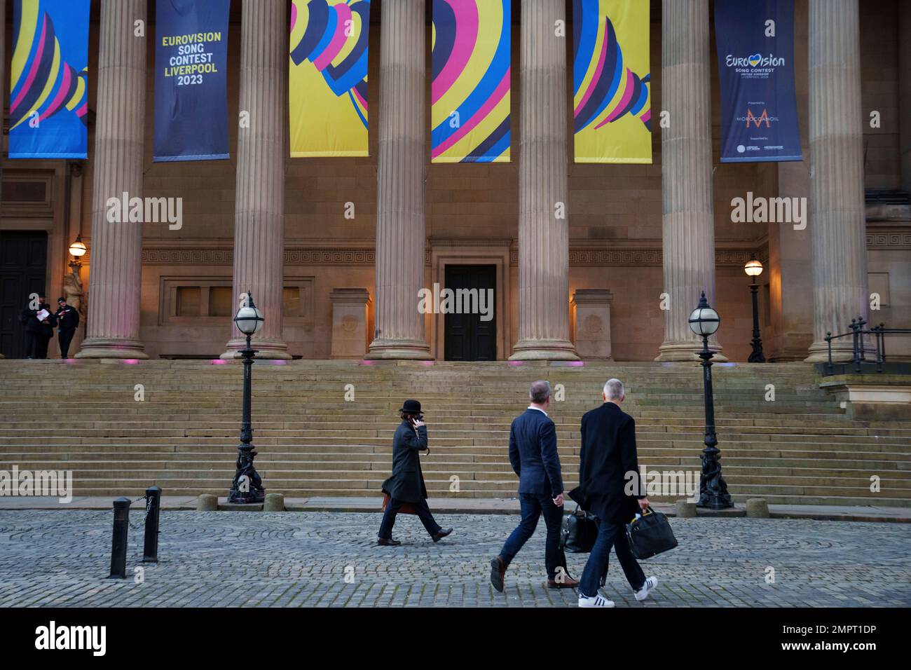 Members of the public pass Eurovision Song Contest signs outside ...