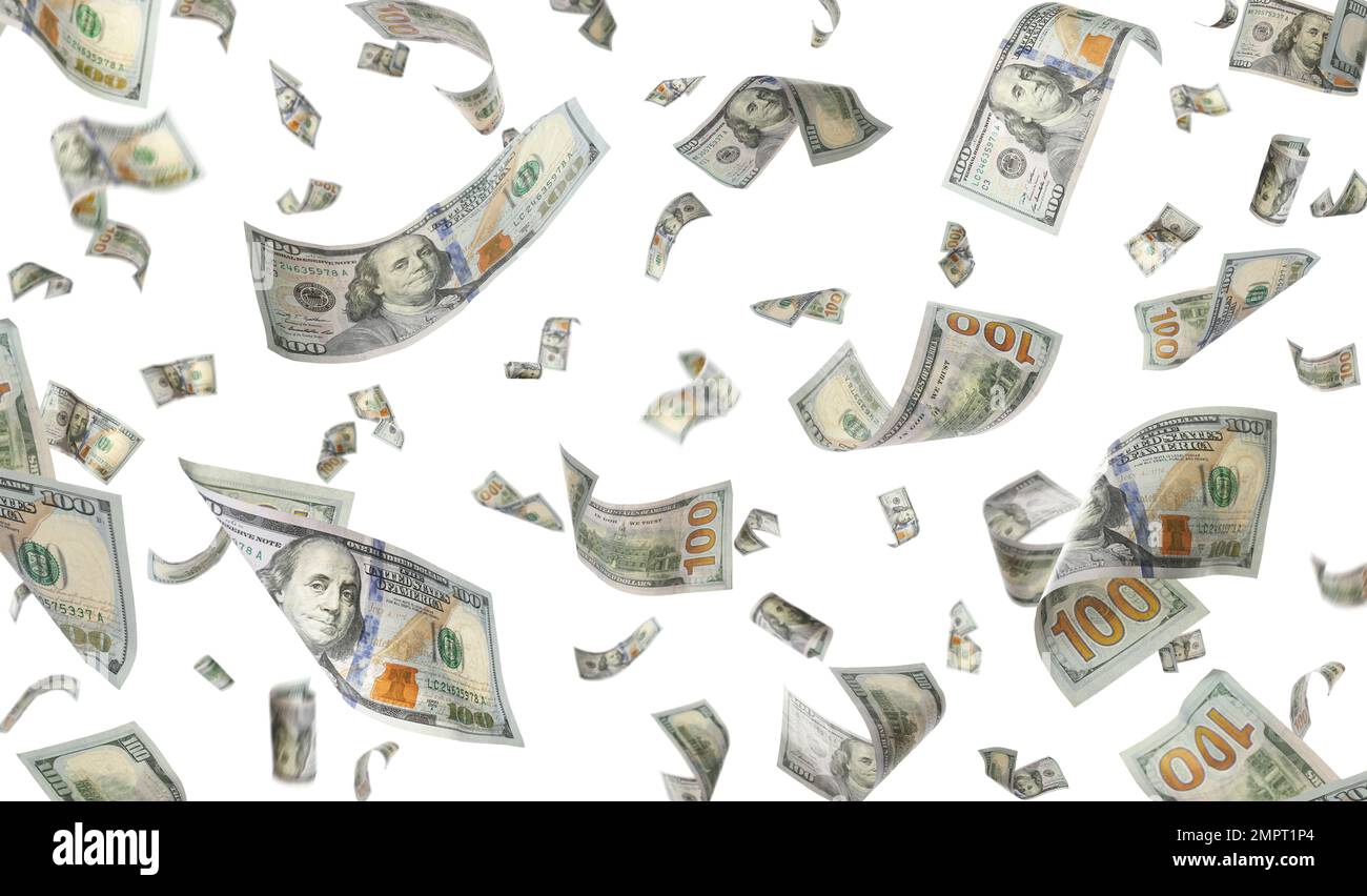 Many American dollars on white background. Flying money Stock Photo - Alamy