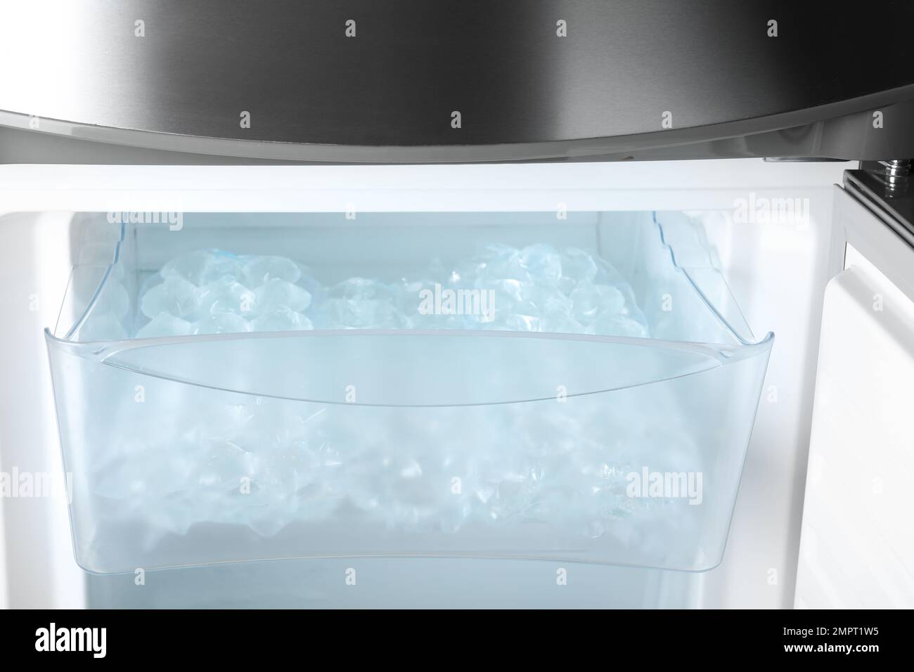 Bags of ice and fridge hi-res stock photography and images - Alamy