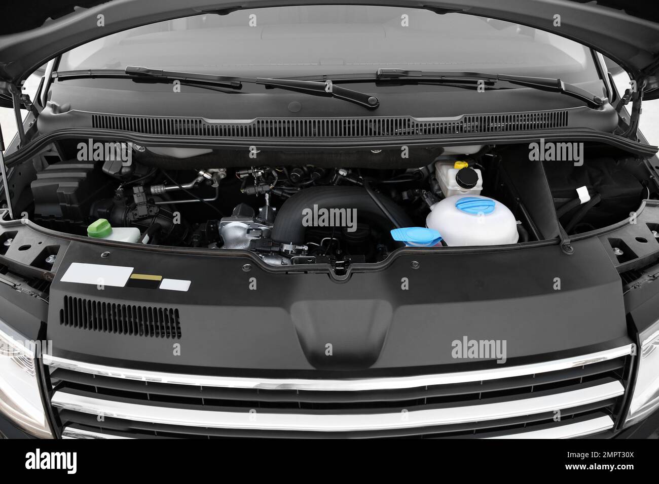 Closeup view of engine bay in modern car Stock Photo - Alamy