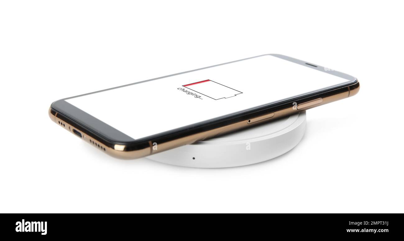 Mobile phone charging with wireless pad isolated on white Stock Photo ...
